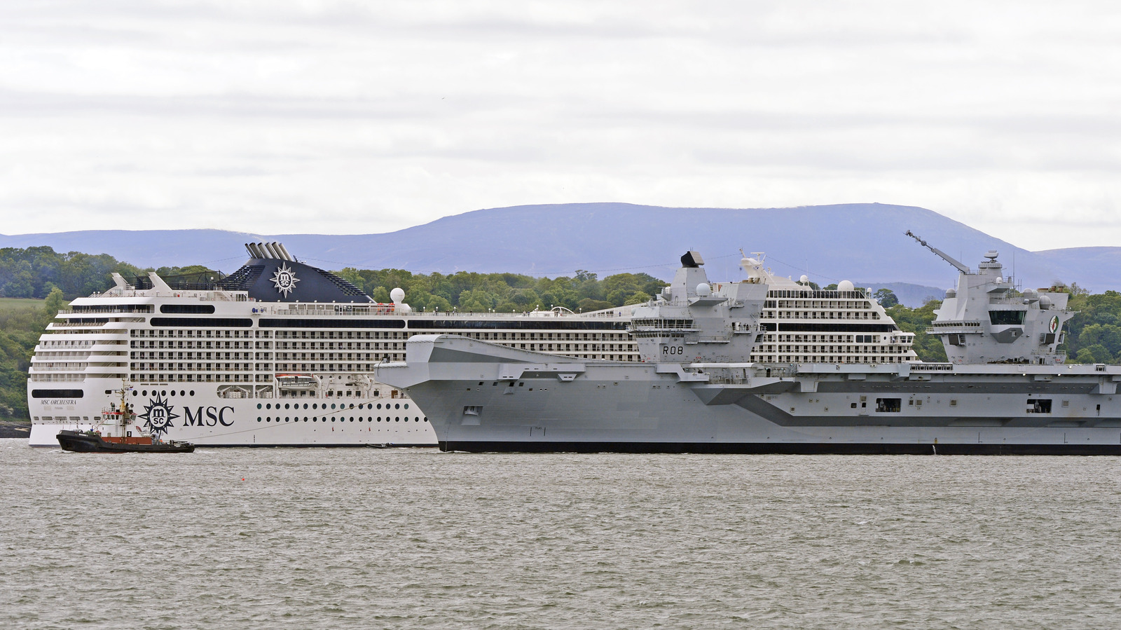 Aircraft Carrier Vs Cruise Ship Size: Which Is The More Massive Boat?