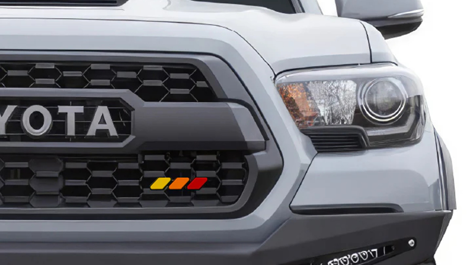 What Does The Tri-Color Badge Mean On A Toyota?