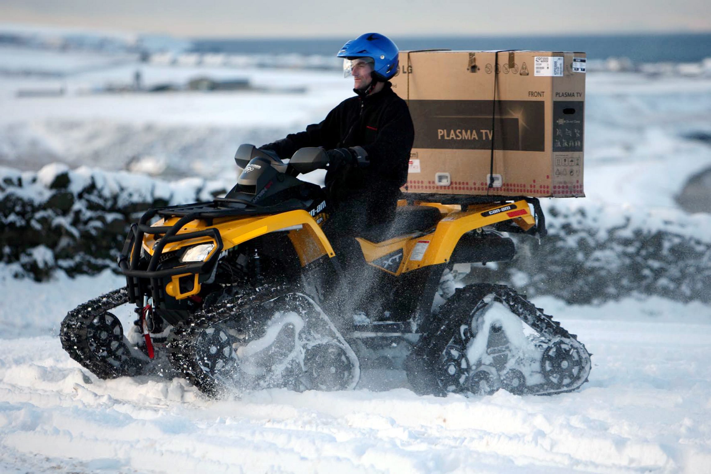 Plasma HDTV gets snow-quad courier in iced-up UK - SlashGear
