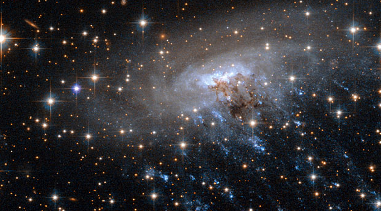 Hubble captures cosmic bloodbath - SlashGear