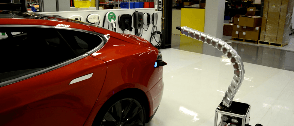 Tesla's "solid metal snake" robo-charger is terrifying - SlashGear
