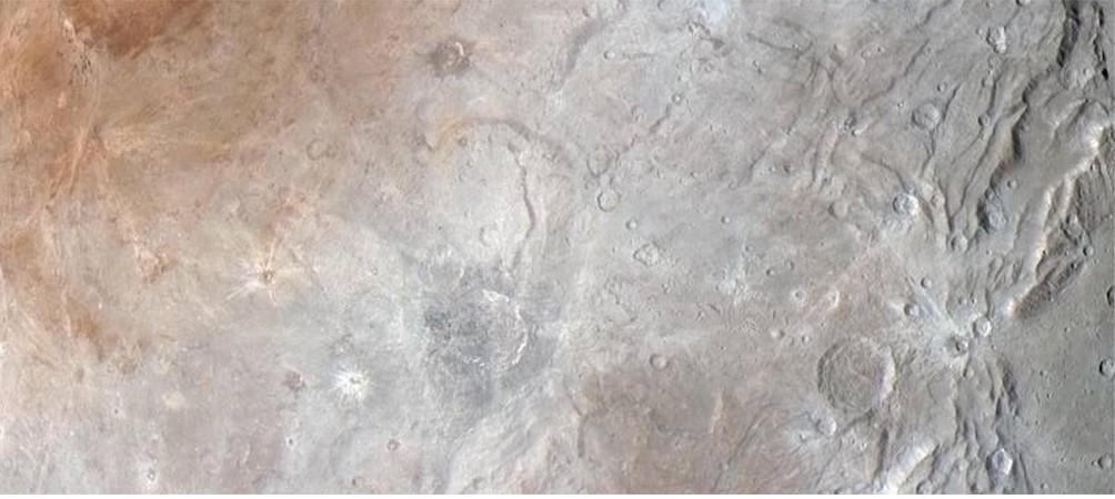 Pluto's biggest moon is a beautiful, scarred wonder - SlashGear