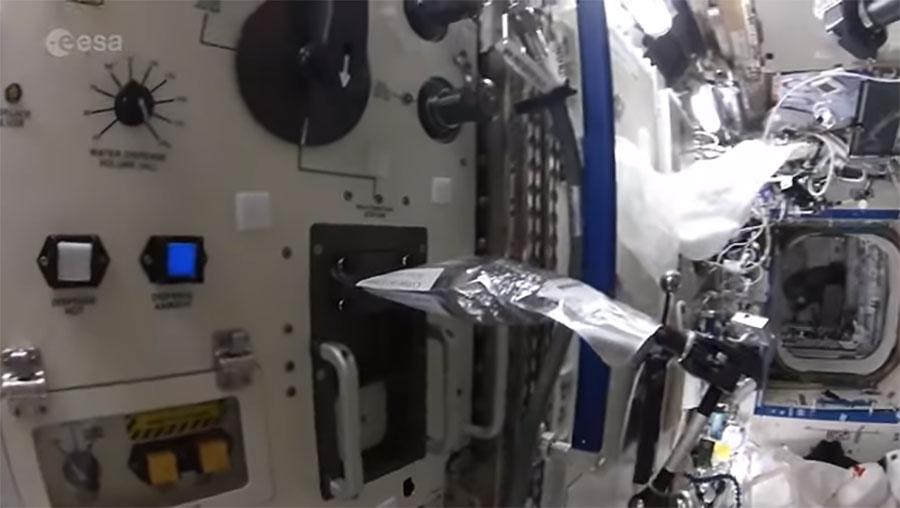 Astronaut shows how coffee is made aboard the ISS - SlashGear