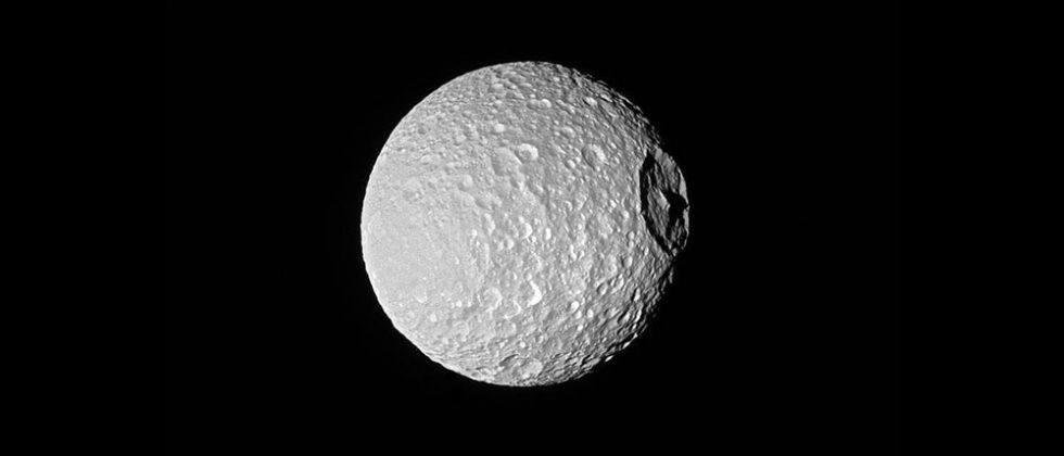Saturn's moon looks like the Death Star in new NASA photo - SlashGear