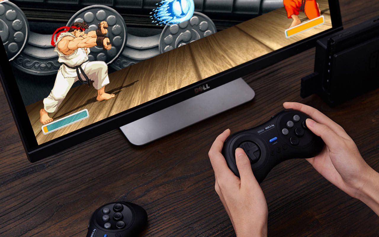 8BitDo M30 2.4G Genesis Mini controller is wireless and has six buttons ...
